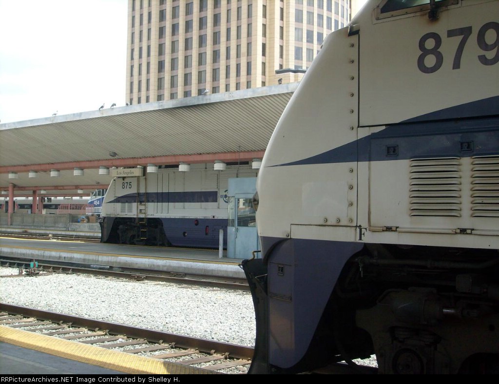 3 trains lined up in the station